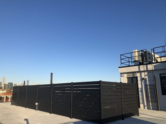Aluminum fence on a rooftop in Brooklyn, NY